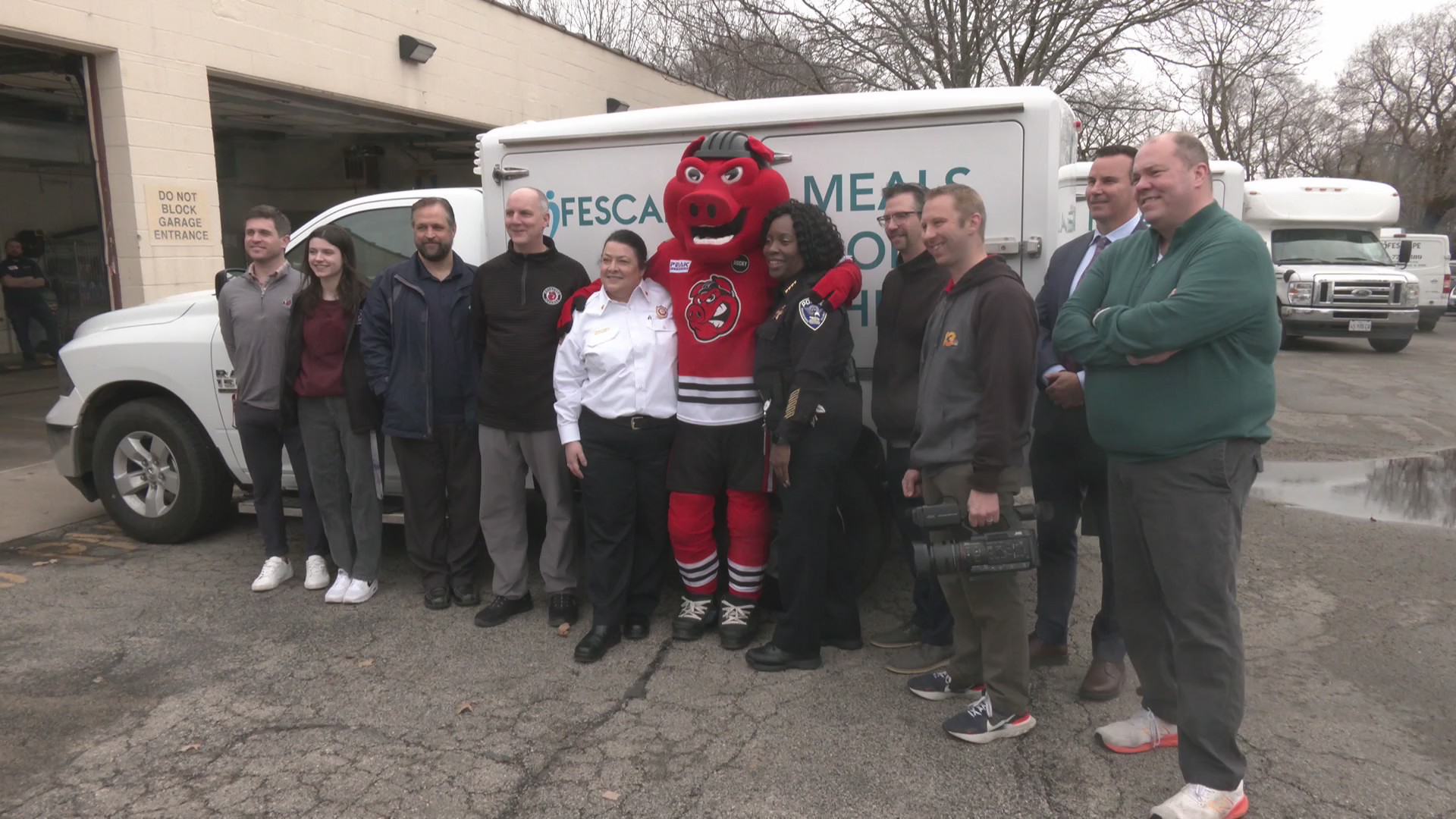 IceHogs mascot Hammy the Hog helps prepare Meals on Wheels for seniors ...