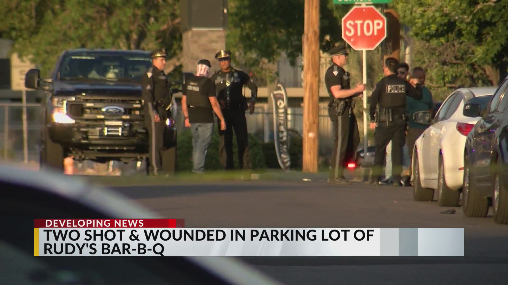 2 injured after a police shooting in the parking lot of Rudy’s Bar-B-Q ...