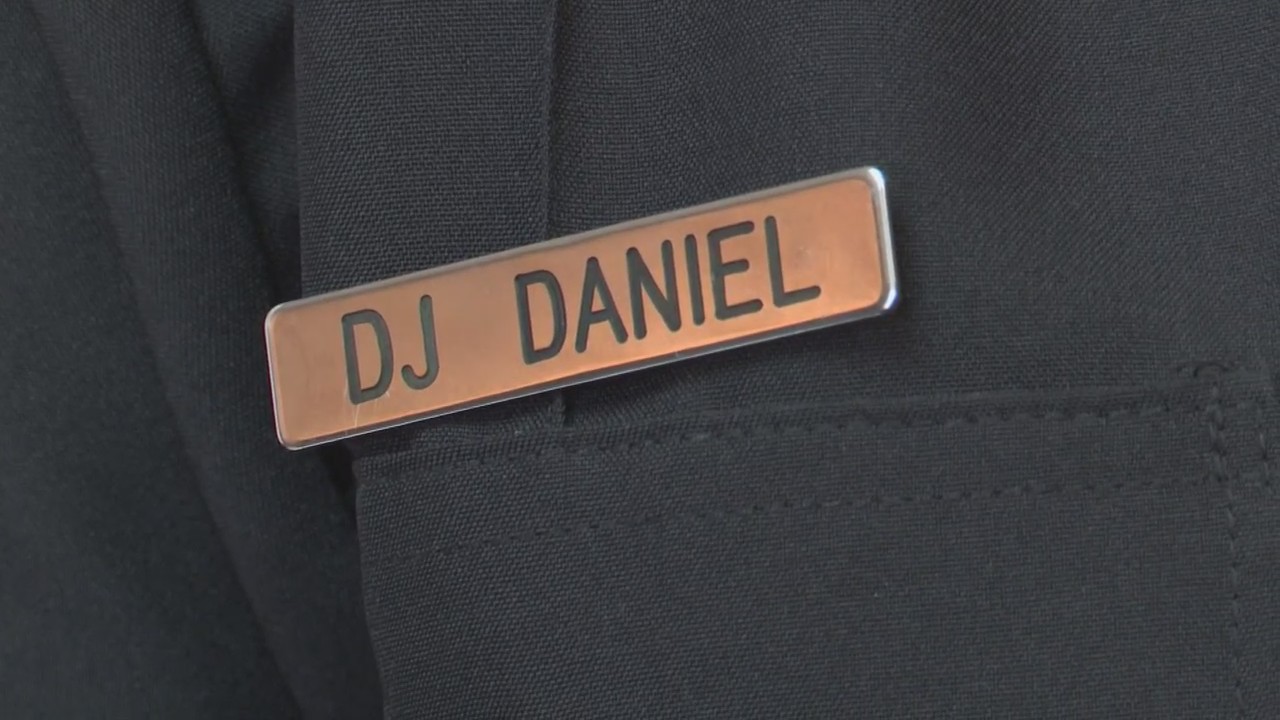 Child with rare brain cancer sworn in as honorary police officer with ...