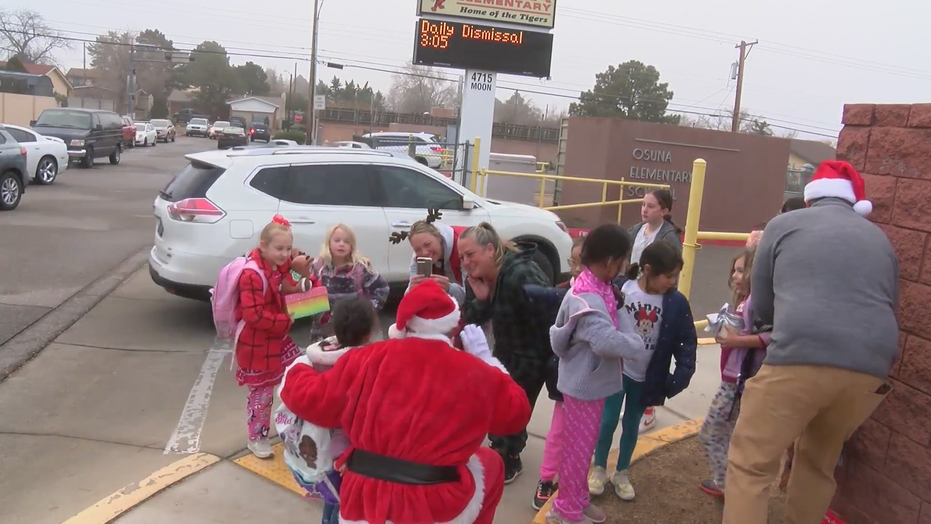 Santa Claus comes by Osuna Elementary one week after Grinch visit ...