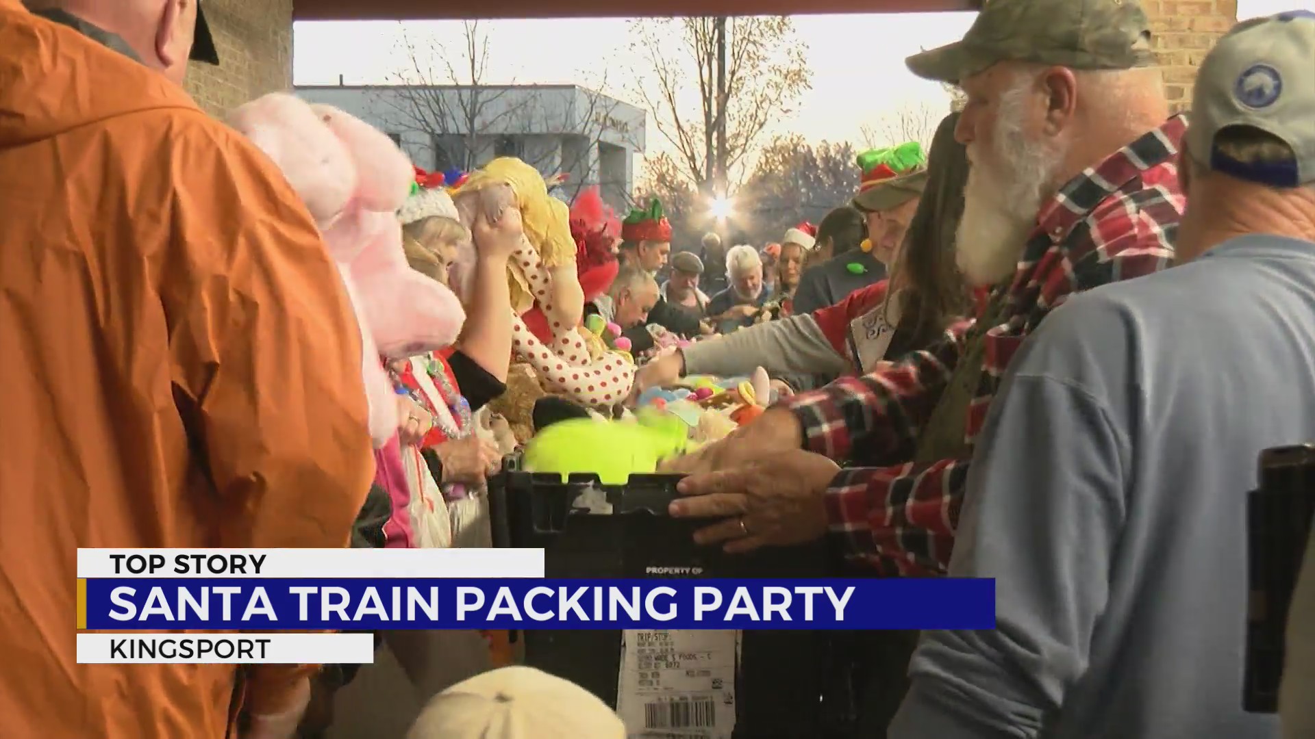 Over 100 volunteers help at Food City’s annual Santa Train Packing ...