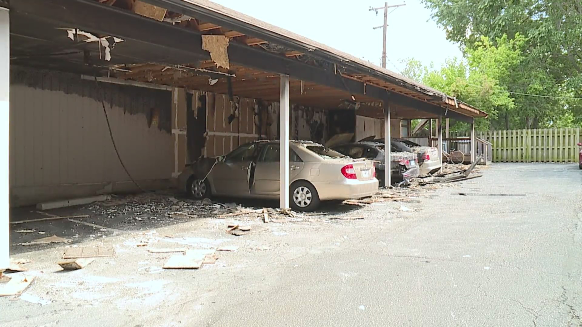 Parked BMW involved in KCFD fire investigation after carport is ...