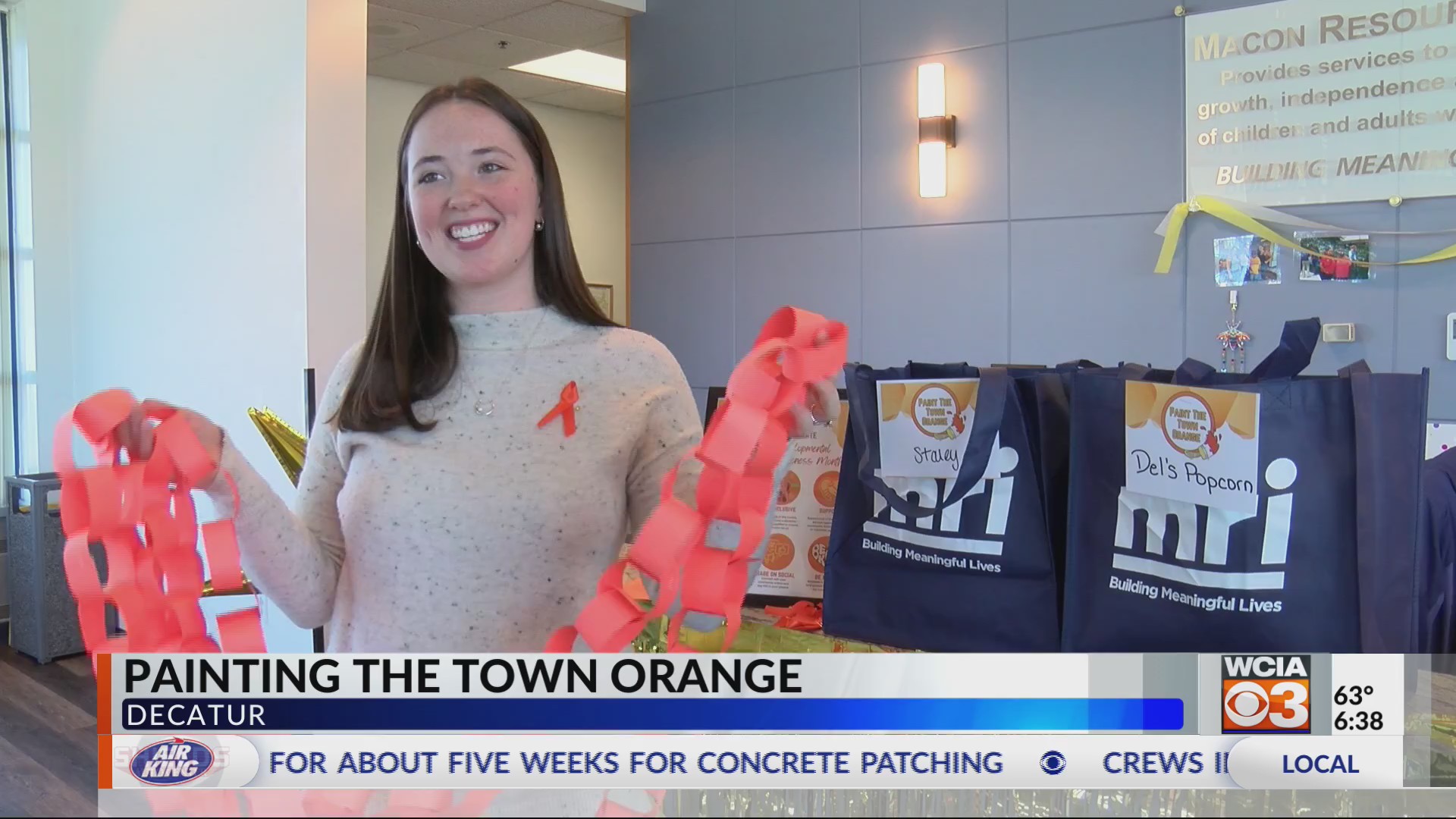 Decatur company paints the town orange for Developmental Disability ...