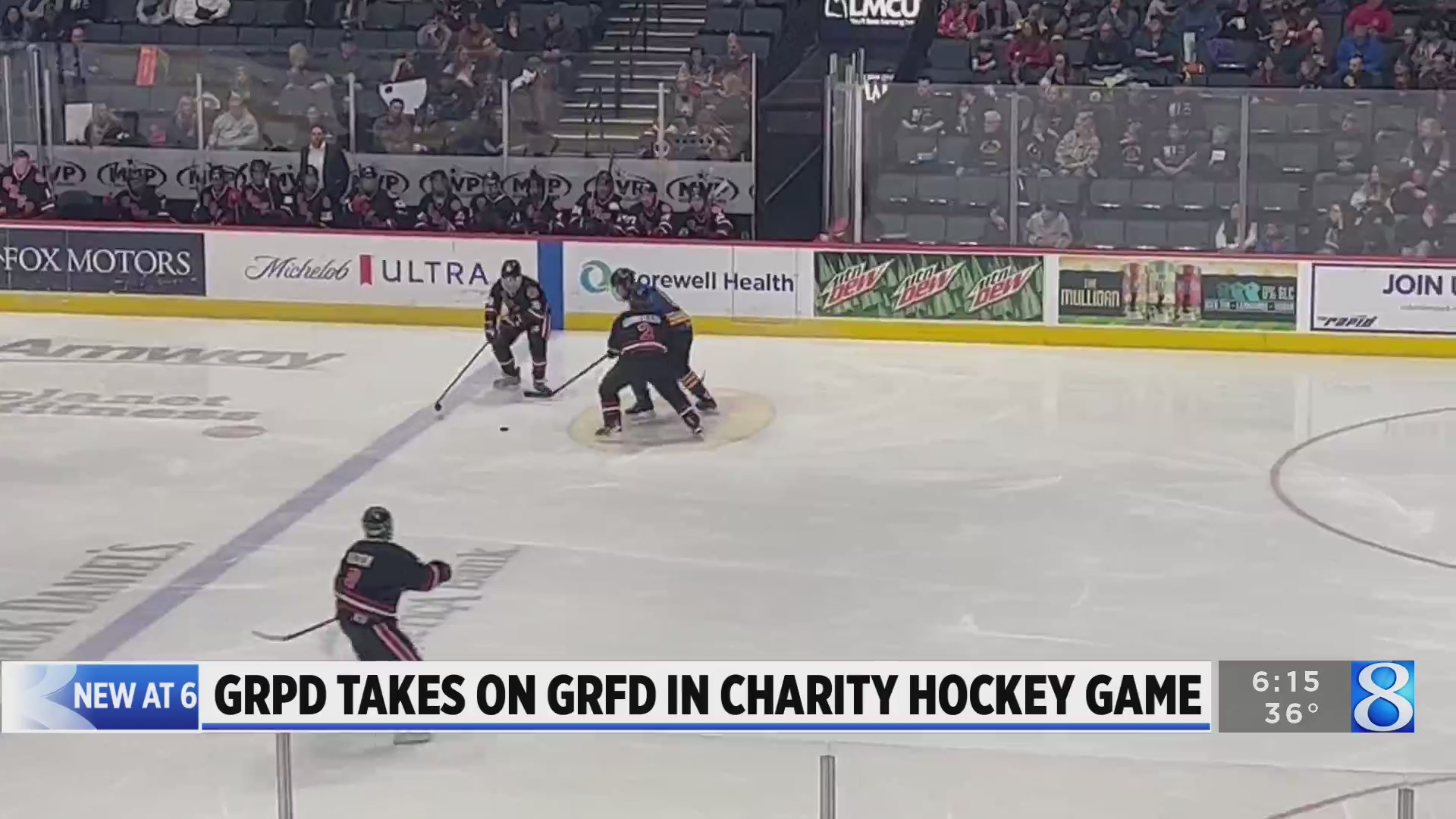 GRPD, GRFD face off in 2nd annual charity hockey game – WOODTV.com