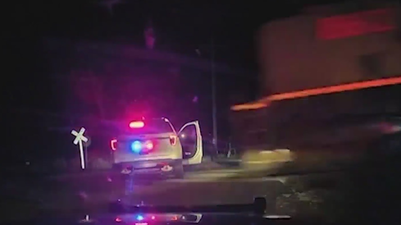 woman-in-police-car-hit-by-train-files-lawsuit-fox31-denver