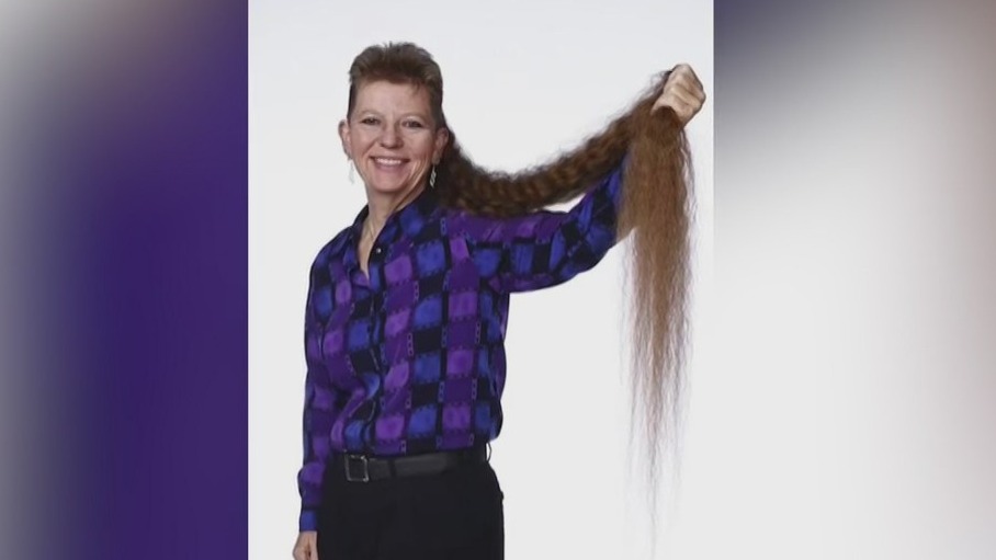 Woman sets record for longest mullet at 5′ 8″ – KTLA