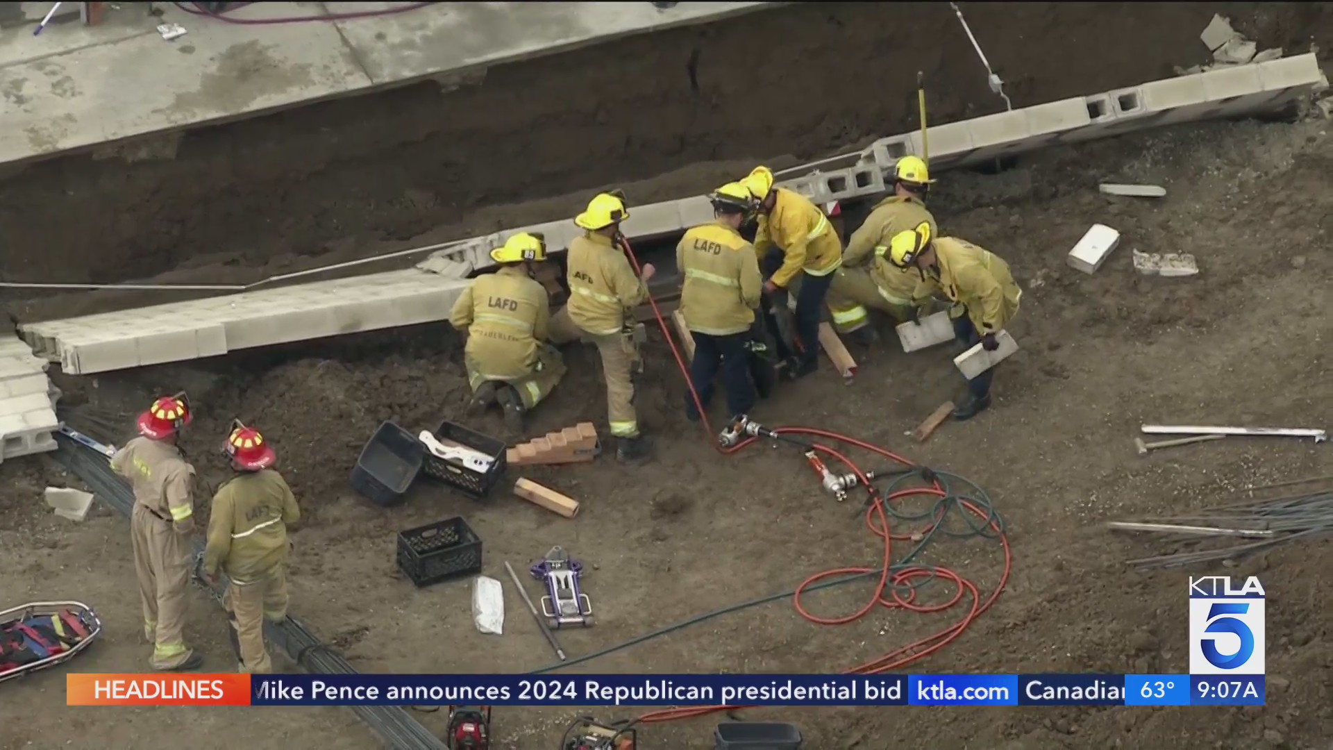Person trapped under concrete wall in Pacoima – KTLA