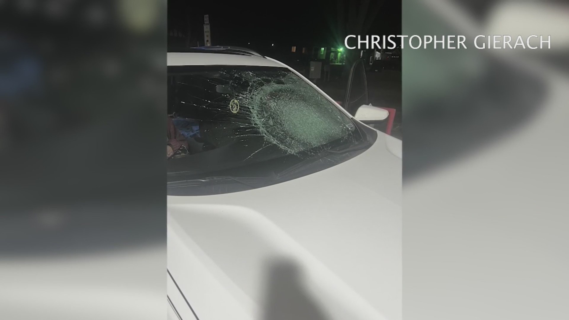 Couple says someone in passing car threw object at them, shattering ...