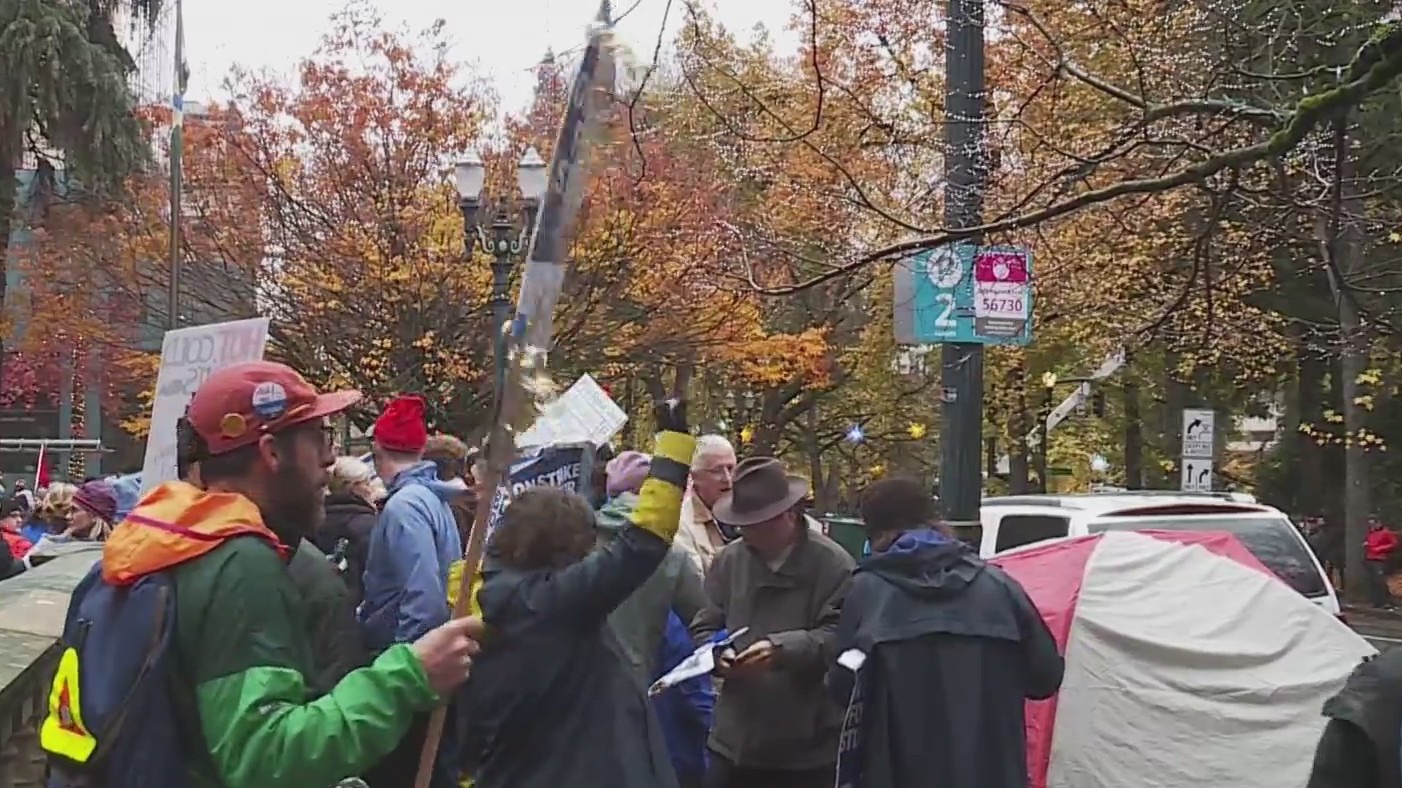 Protesters gather outside Portland City Hall in support of teachers as ...