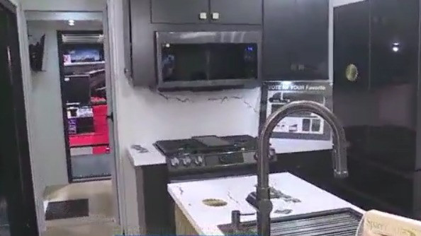 This $600K RV at the KC RV Show has an island kitchen and much more ...