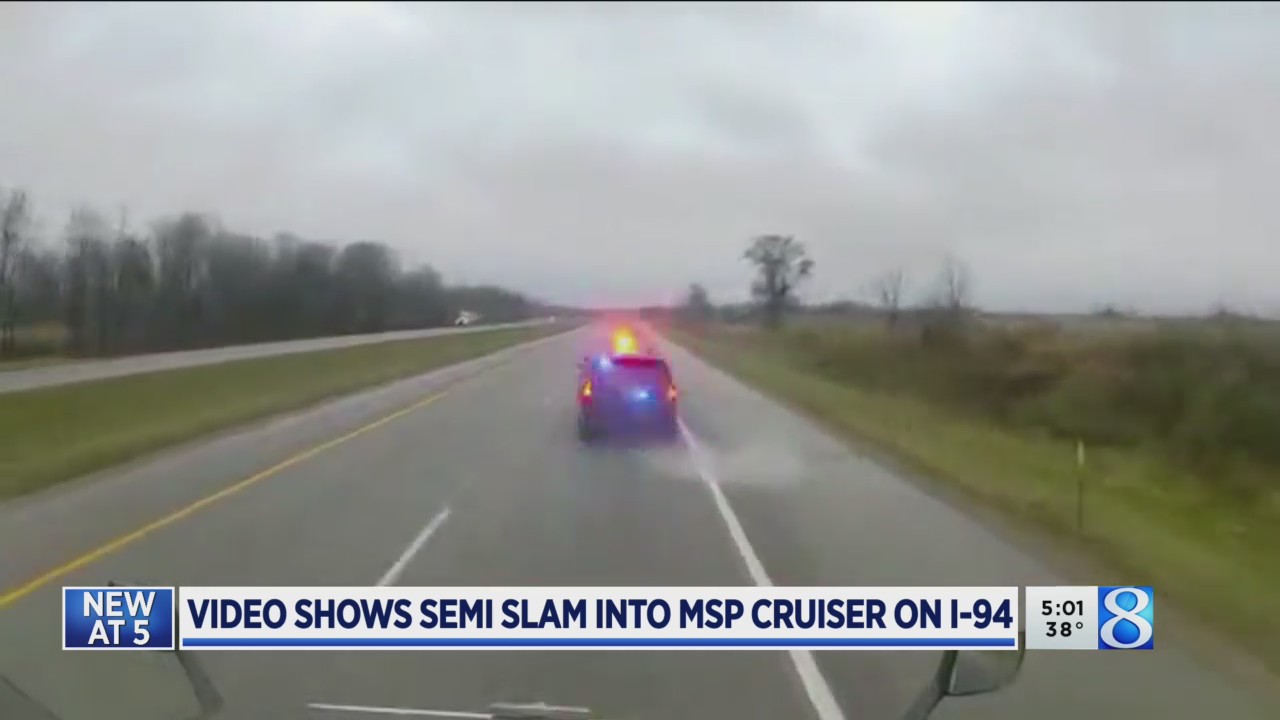 Watch: Semi-truck crashes into MSP cruiser – WOODTV.com