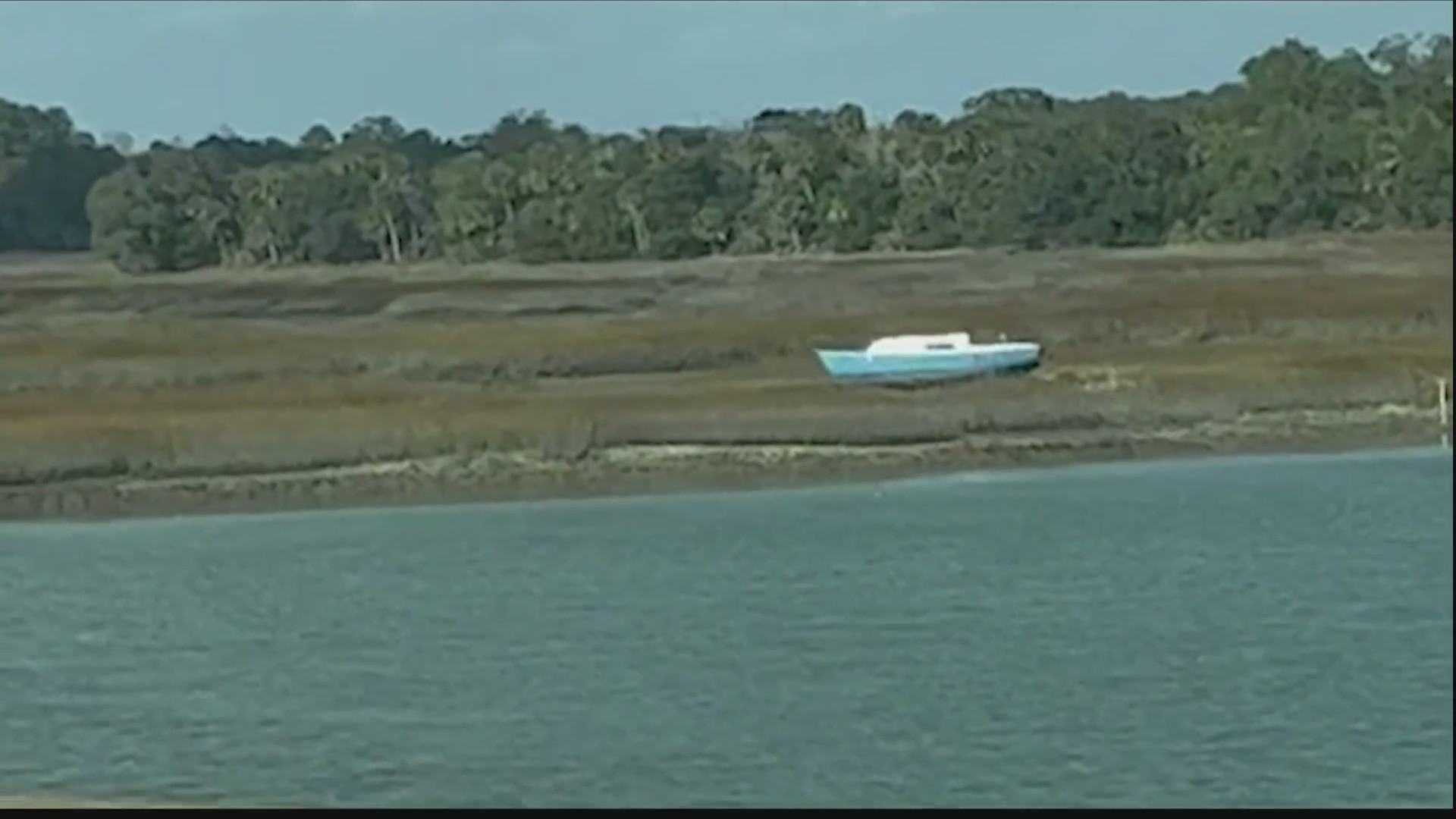 What’s the story behind the little blue boat sitting on the marsh in ...