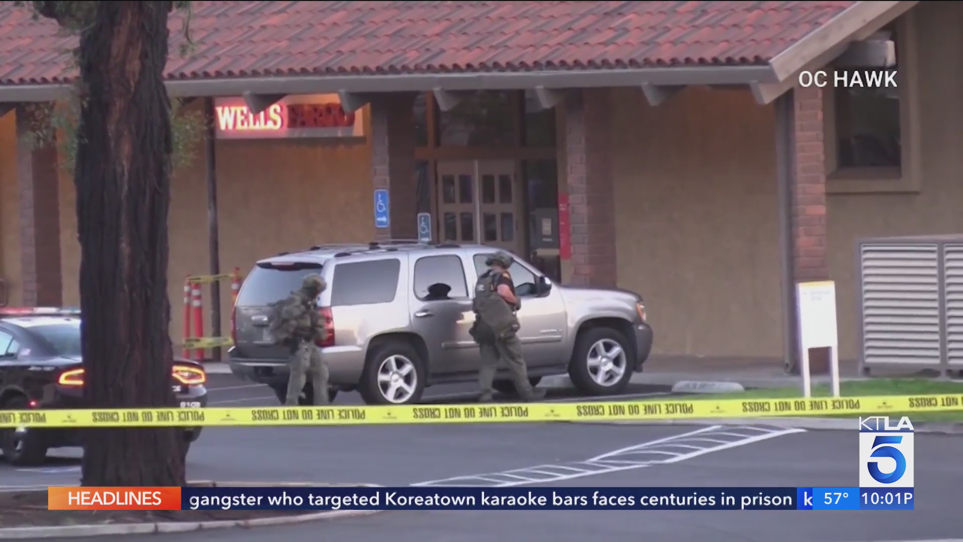Man killed after bomb threat prompts evacuation of Orange County bank ...