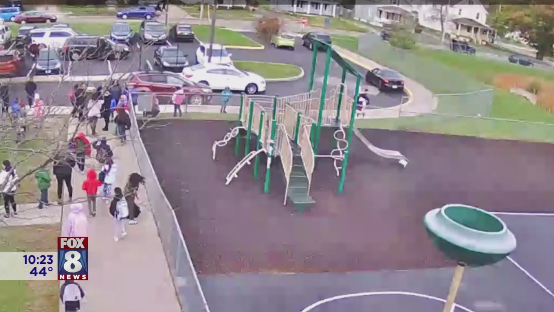 Video: Officer chases suspect, kids run inside after shooting near ...