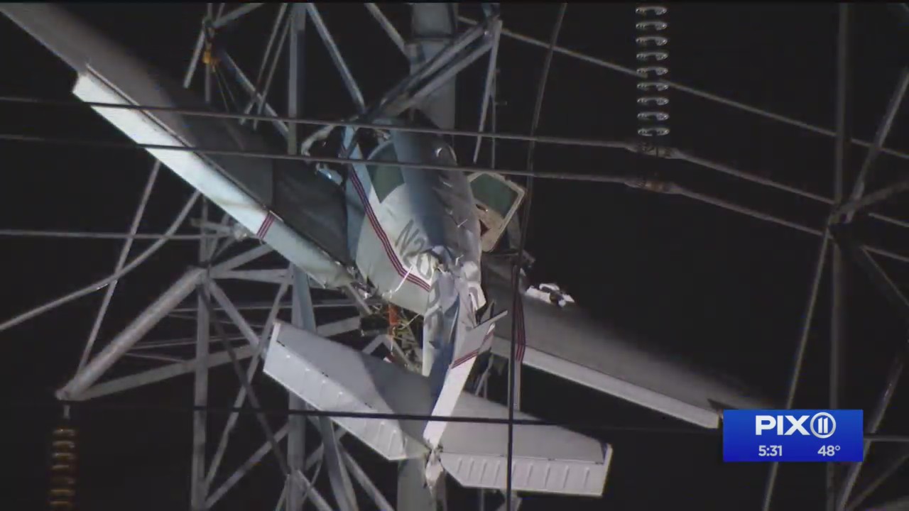 Crews rescue 2 from plane caught in power lines in MD – PIX11