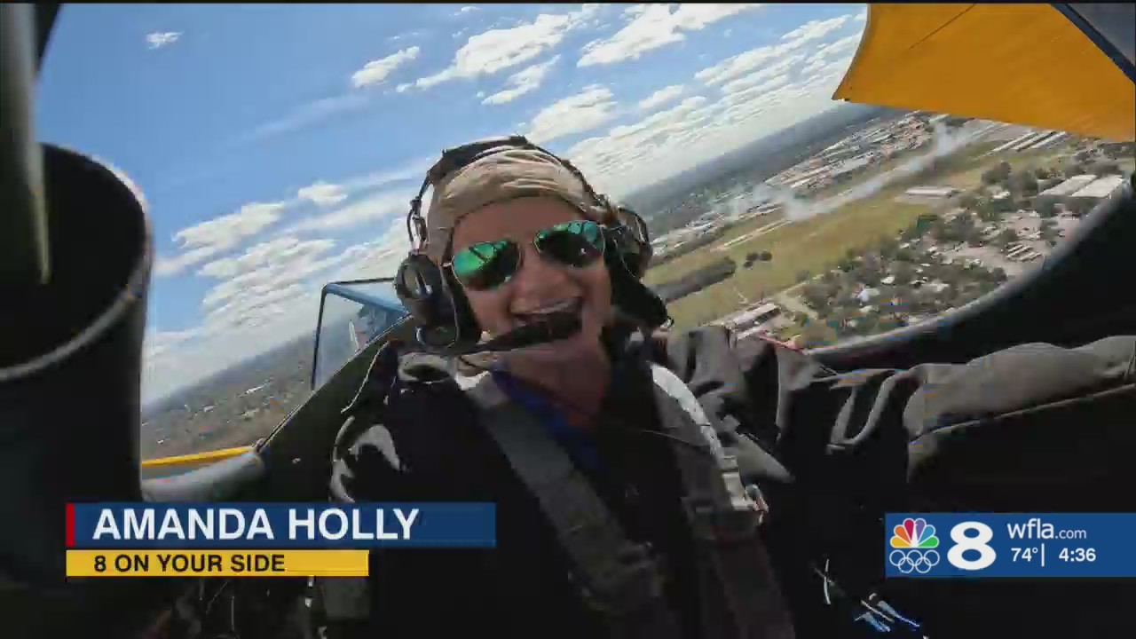 Amanda rides in a stearman biplane – WFLA