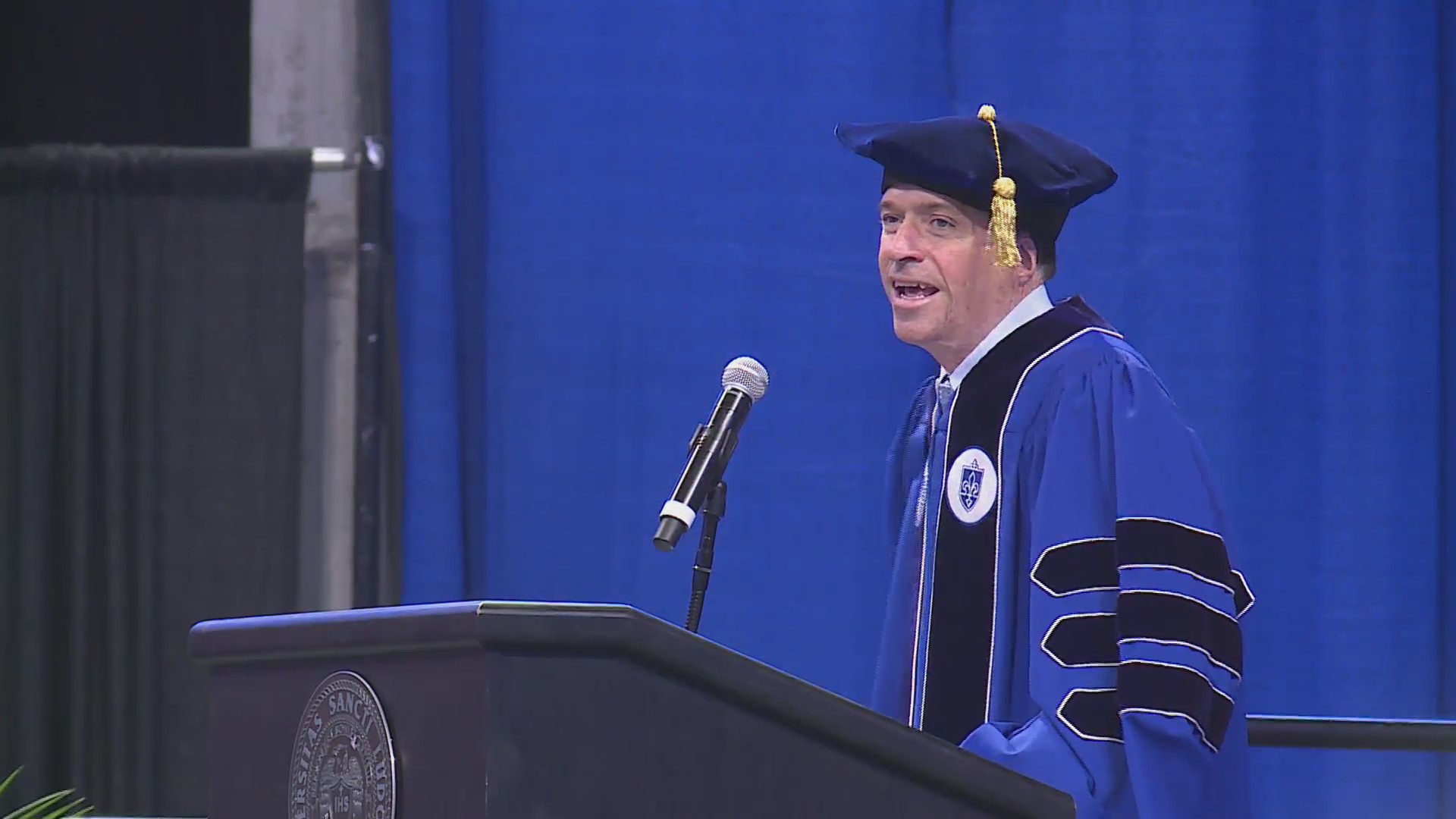 Fire survivor shares inspiring message during SLU graduation ceremony ...