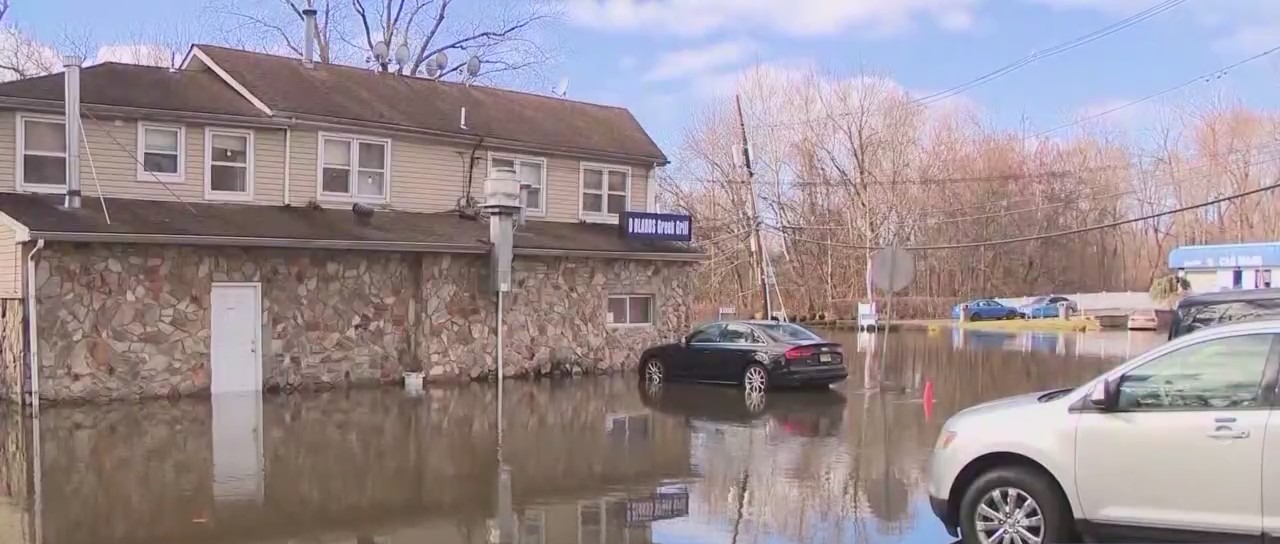 New Jersey families return to neighborhoods affected by flood waters ...