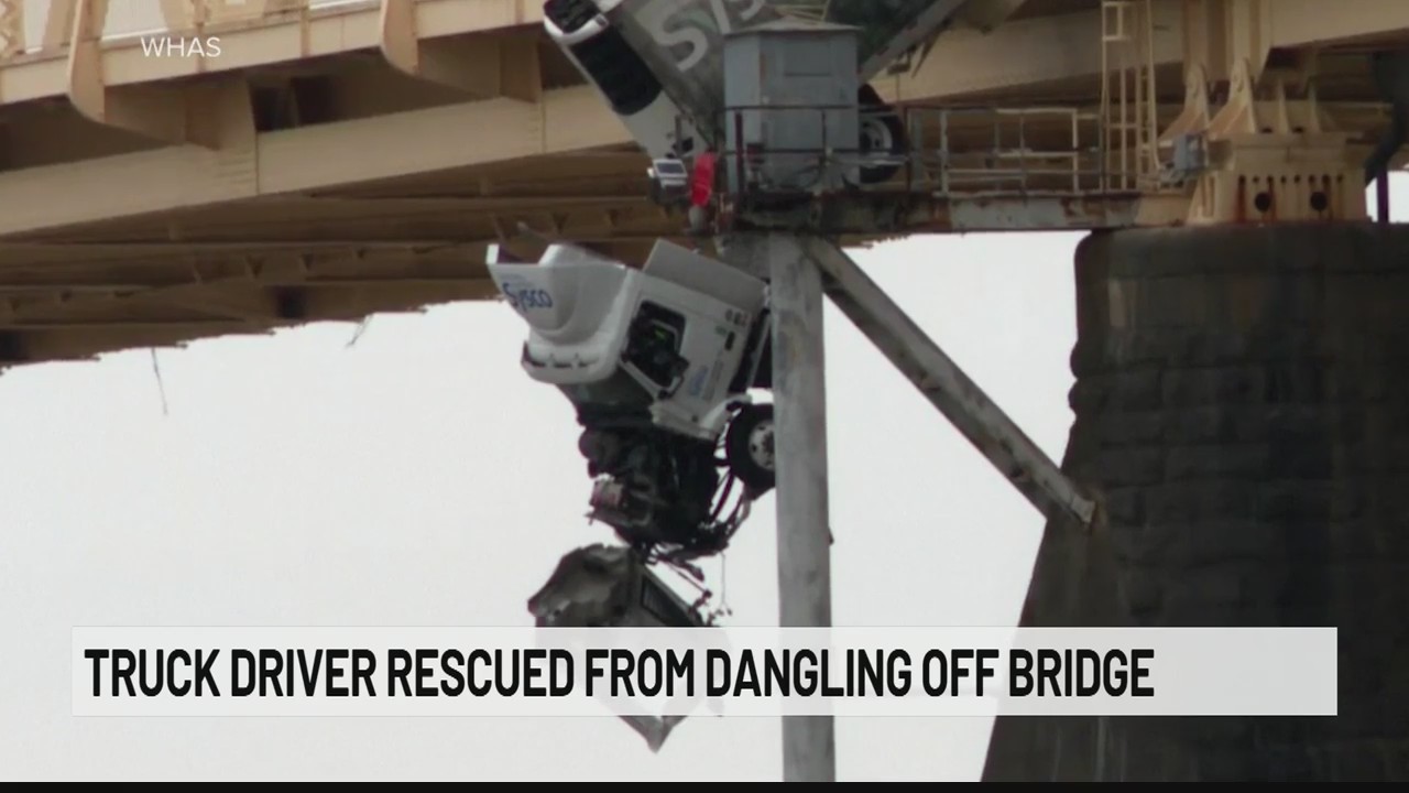 Truck driver rescued from dangling off bridge – NEWS10 ABC