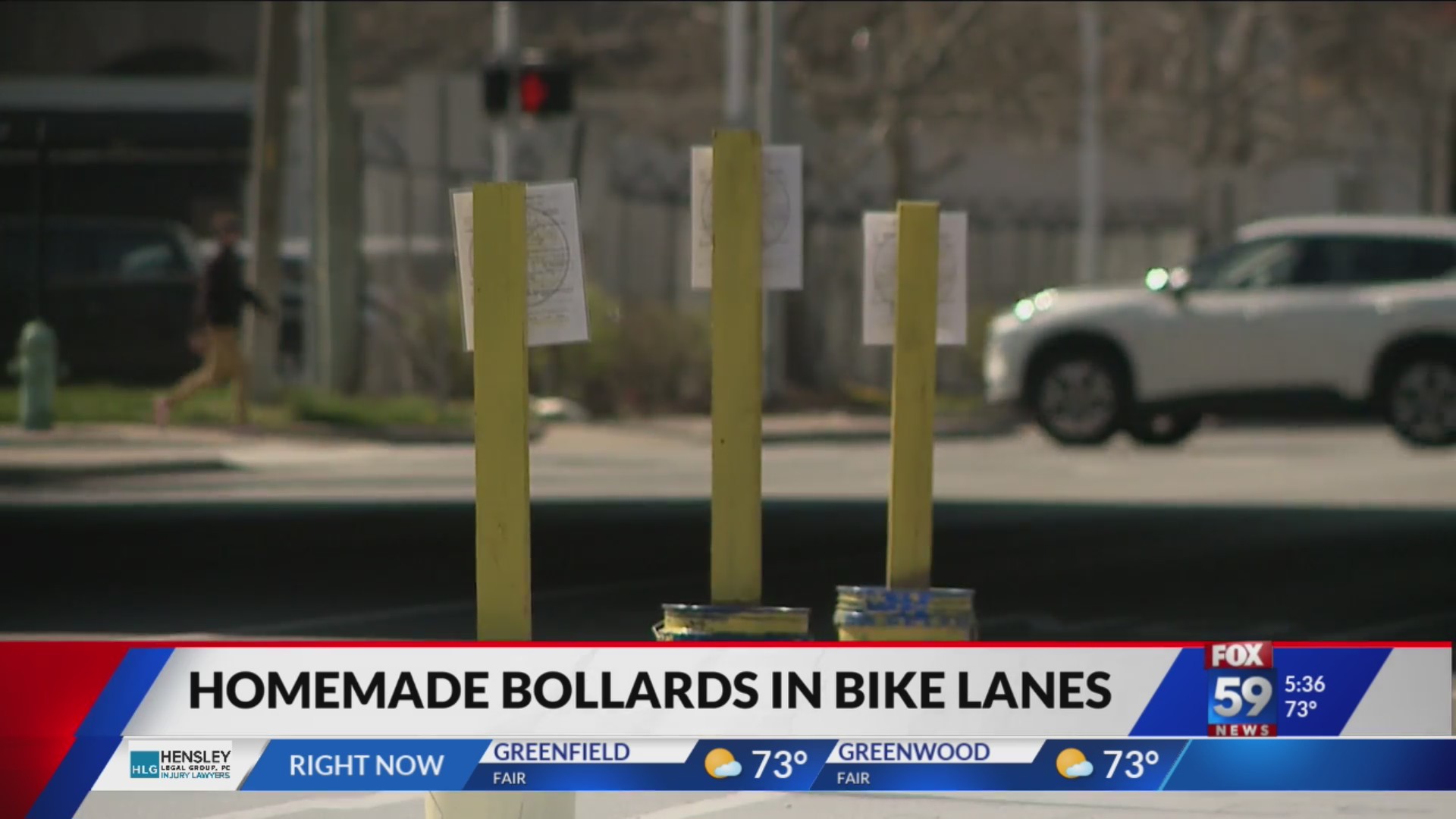 Tactical urbanism project putting homemade bollards between traffic and ...