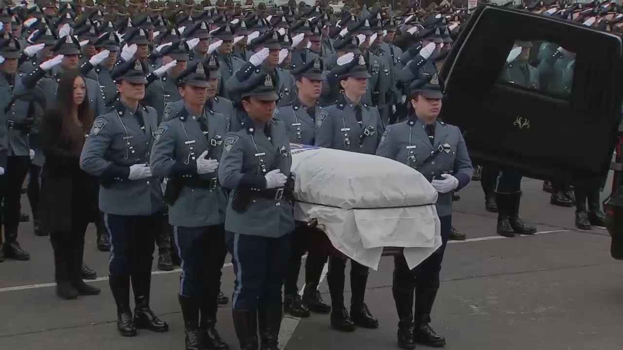 VIDEO NOW: Trooper Bucci casket brought inside church – WPRI.com