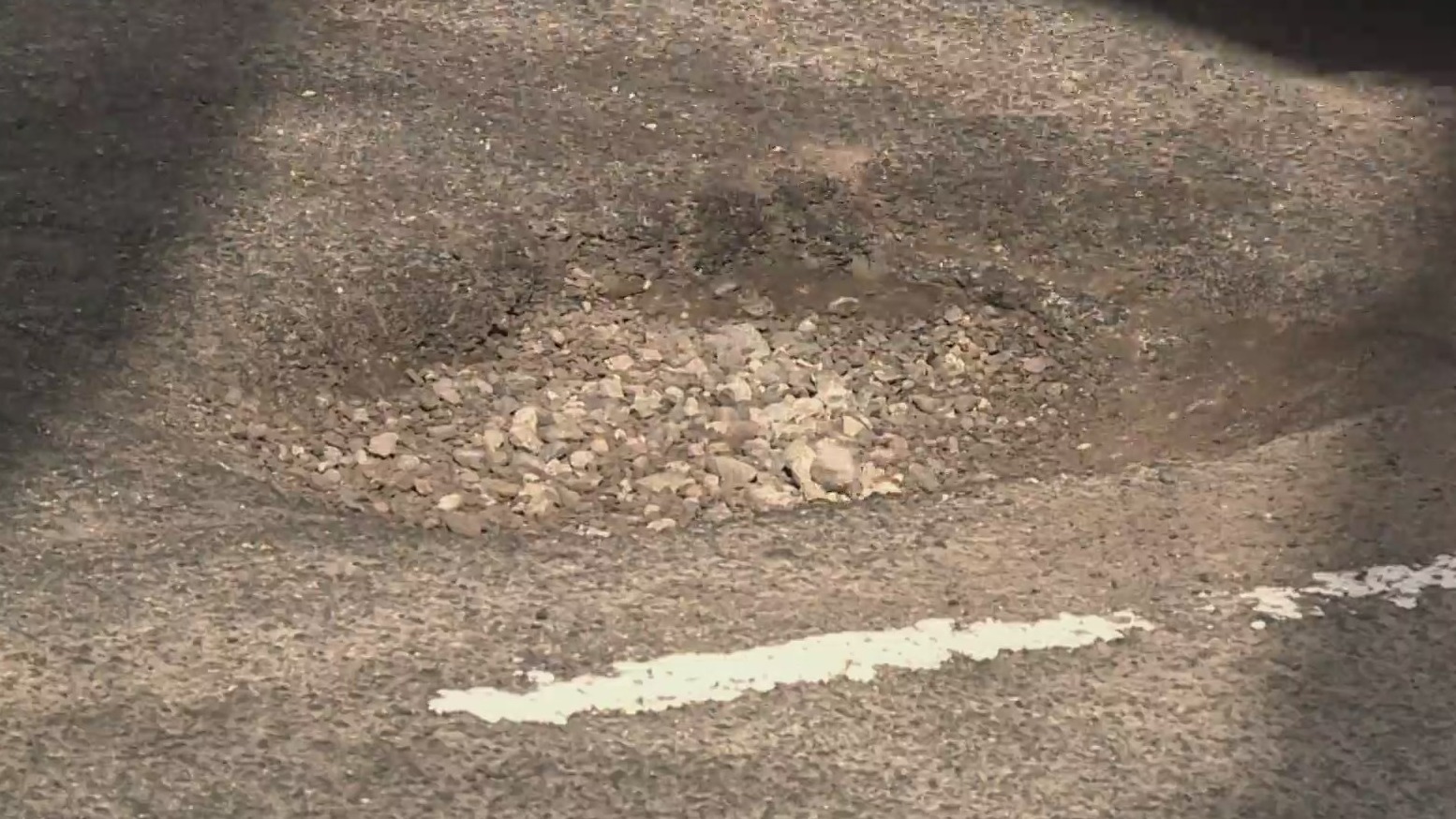 30 Days, 1,678 potholes: Fixing the roads of downtown Portland – KOIN.com