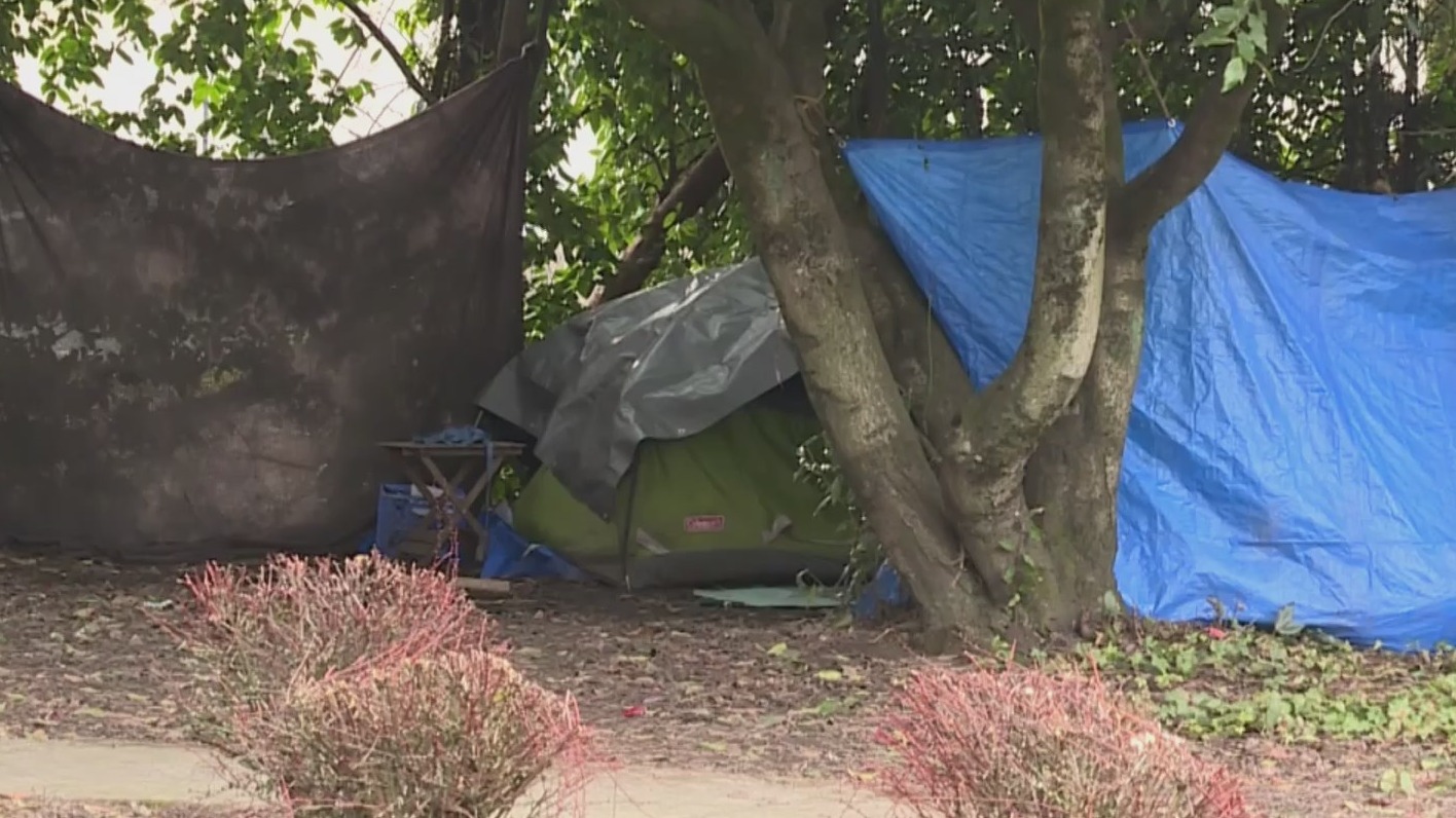 Neighbors of future Clinton Triangle call mass camp a ‘BandAid’ to ...