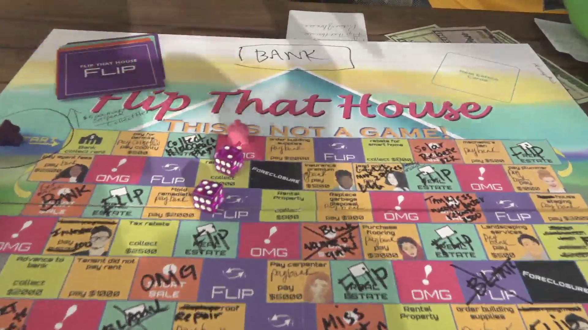 Local woman invents new board game to teach people about real estate ...