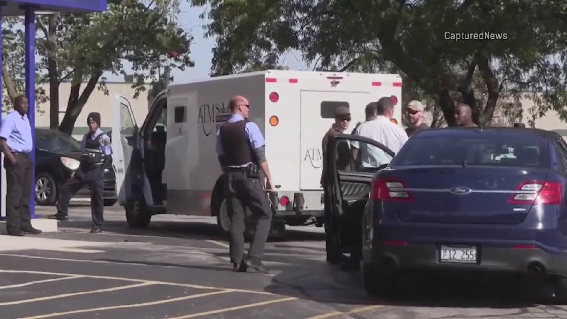 FBI: 3 masked men conduct armed robbery at Dolton bank’s ATMs – WGN-TV