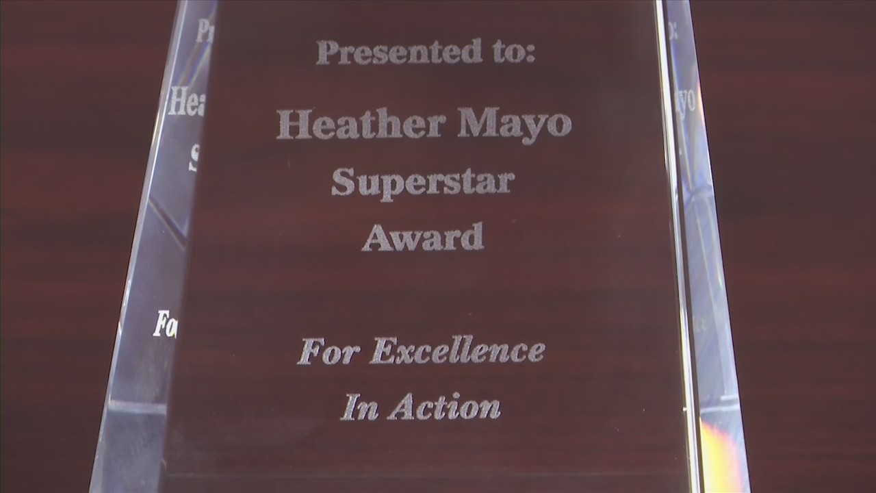‘Superstar’ dispatcher awarded for dramatic water rescue of husband and ...