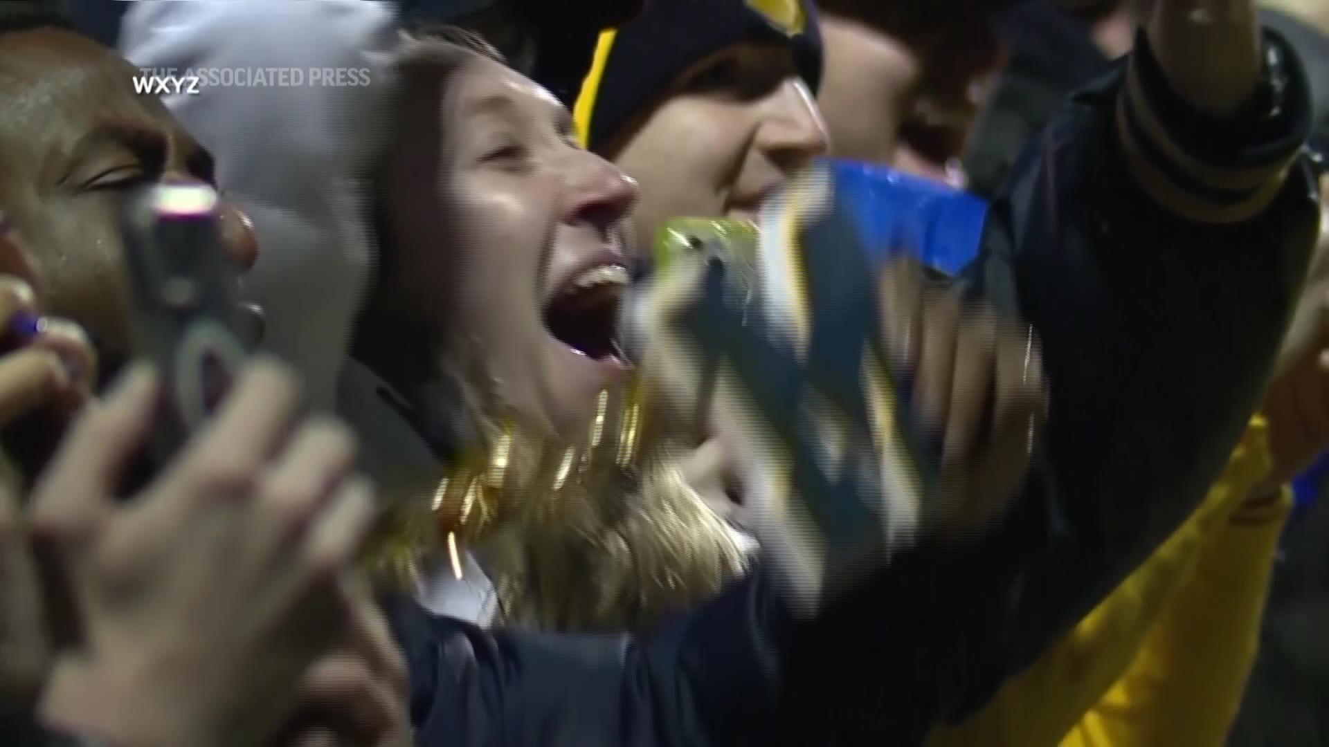 Michigan Wolverines rally with screaming fans after winning national ...