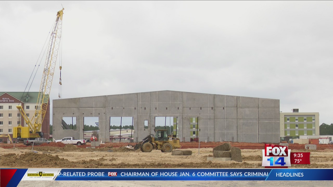 Construction crews put up first tilt panels for the structure of West ...