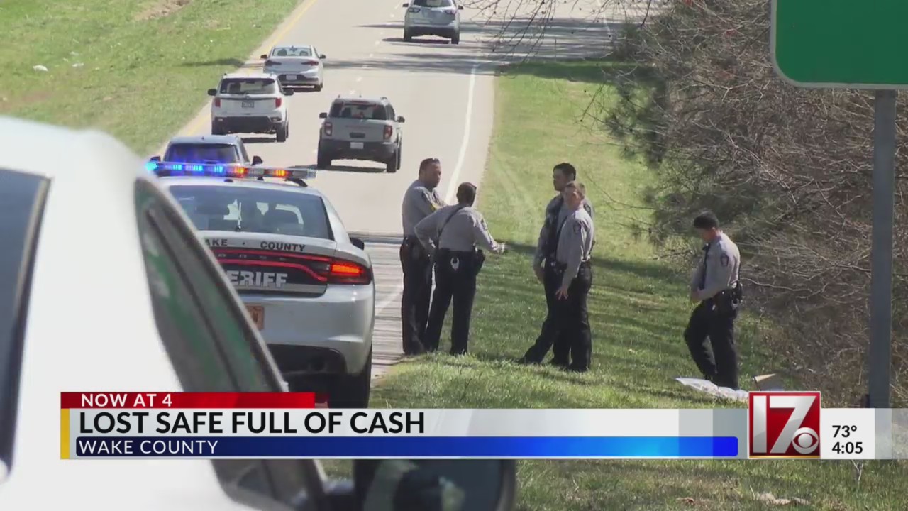 People scramble for cash seen floating around after open safe found on ...