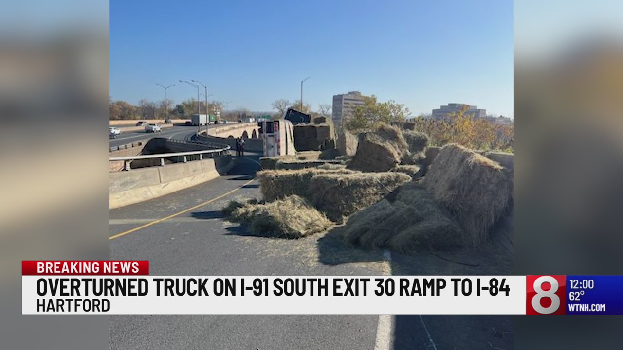Overturned tractor-trailer spills bales of hay onto I-91S in Hartford ...