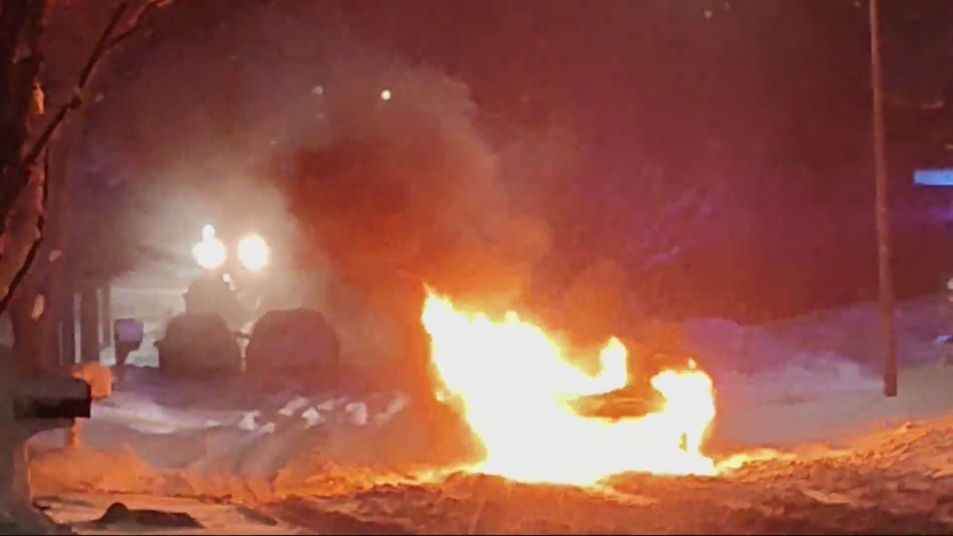 Car catches fire as driver spins tires while stuck in snow-covered Des ...