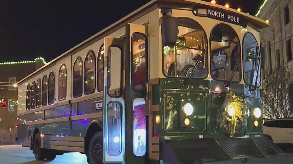 Santa hops aboard Polar Express Trolley in Graham – FOX8 WGHP