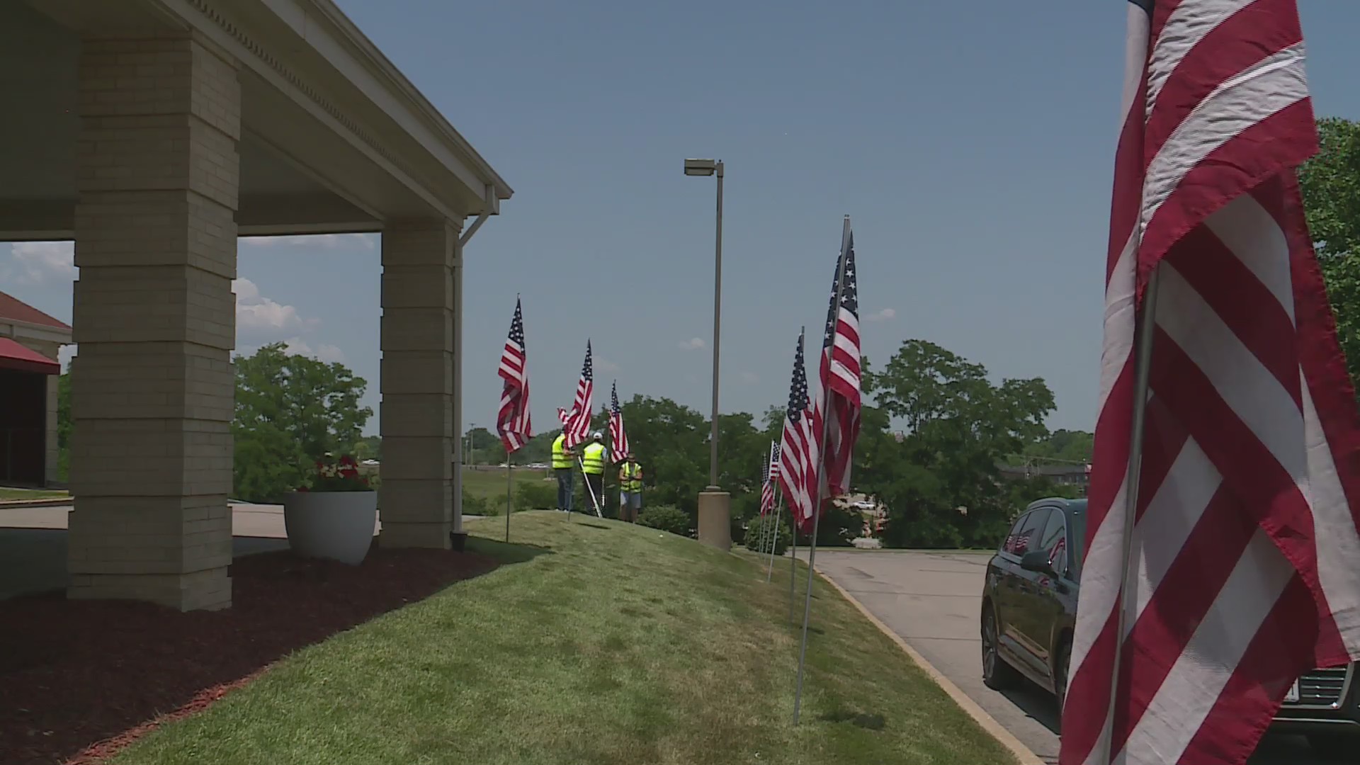 Local group displays hundreds of flags to honor fallen marine – FOX 2