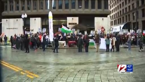 Crowd protesting outside Textron building in Providence – WPRI.com