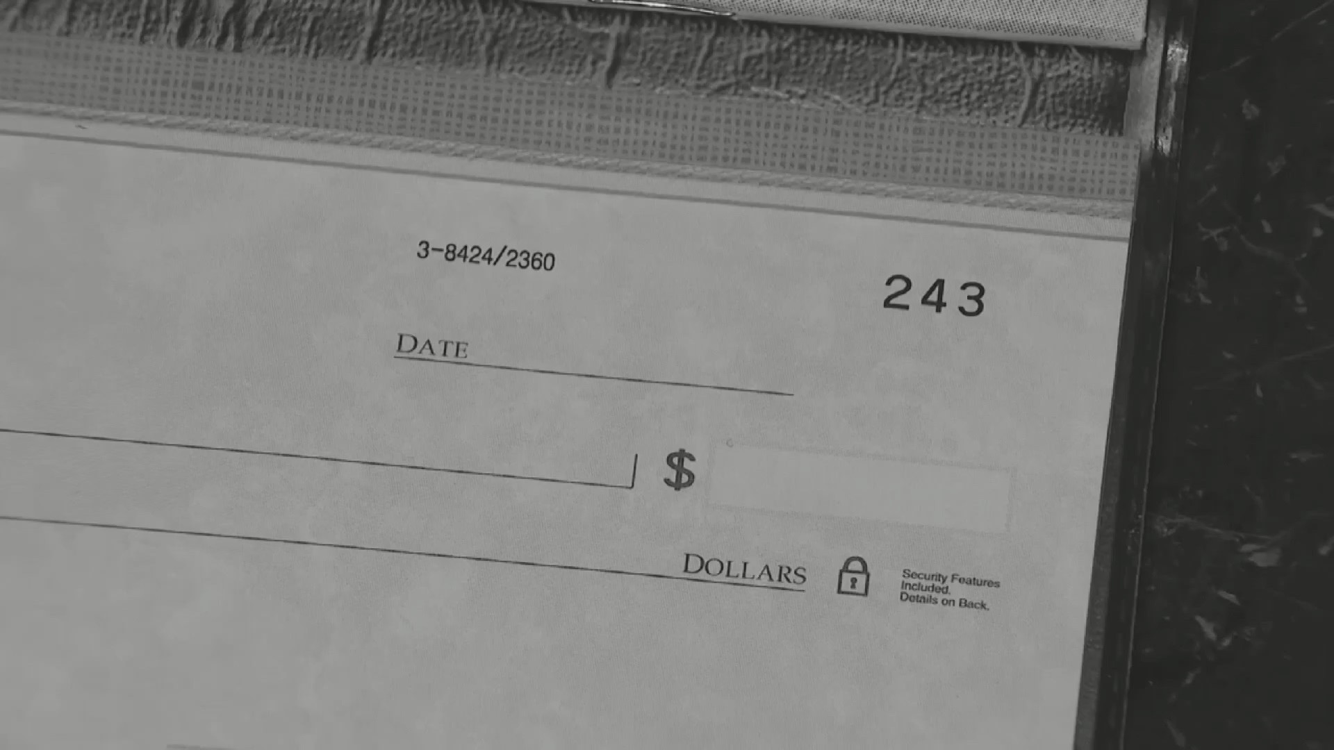 Federal fraud suspect released before cashing $40K false check in ...