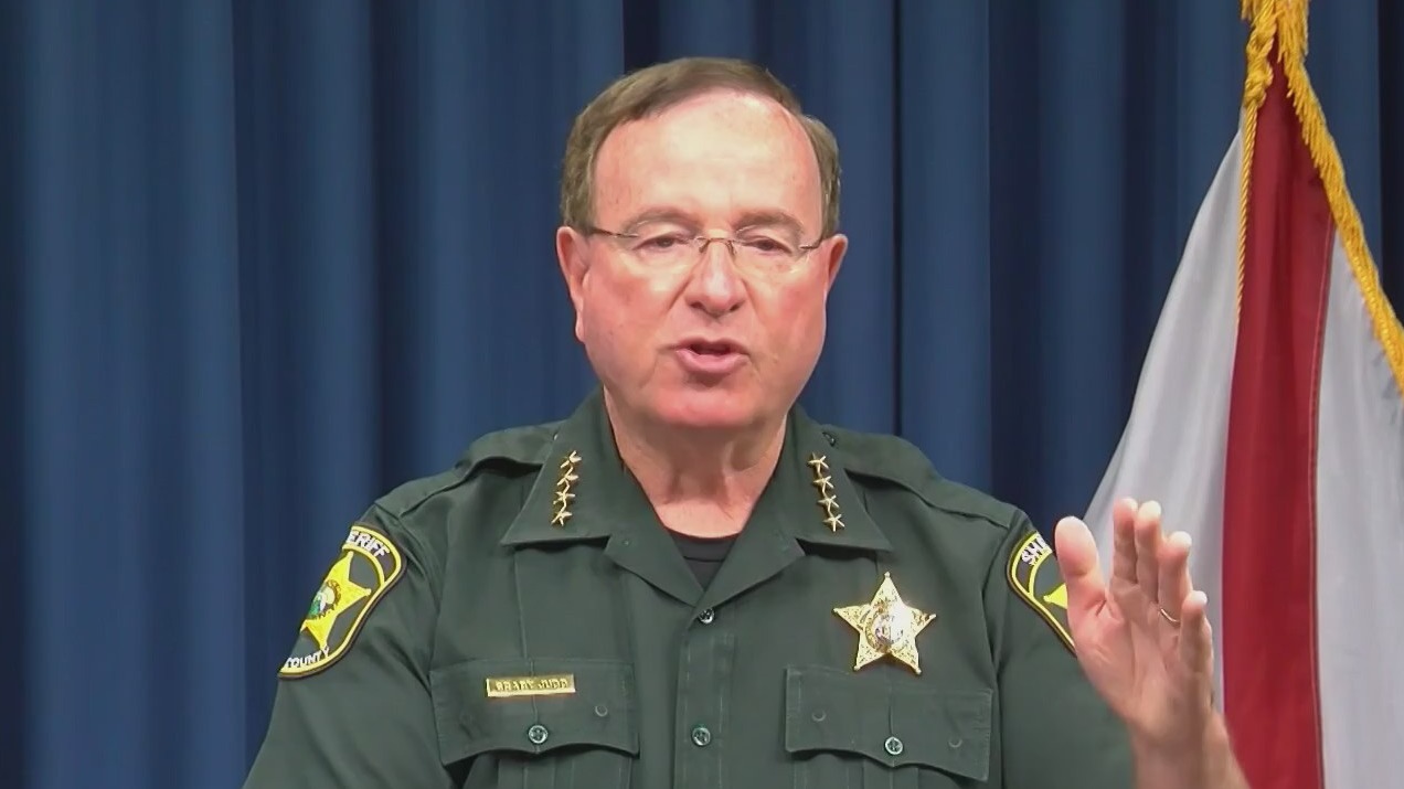Sheriff: Father, son open fire on innocent woman they think is home ...