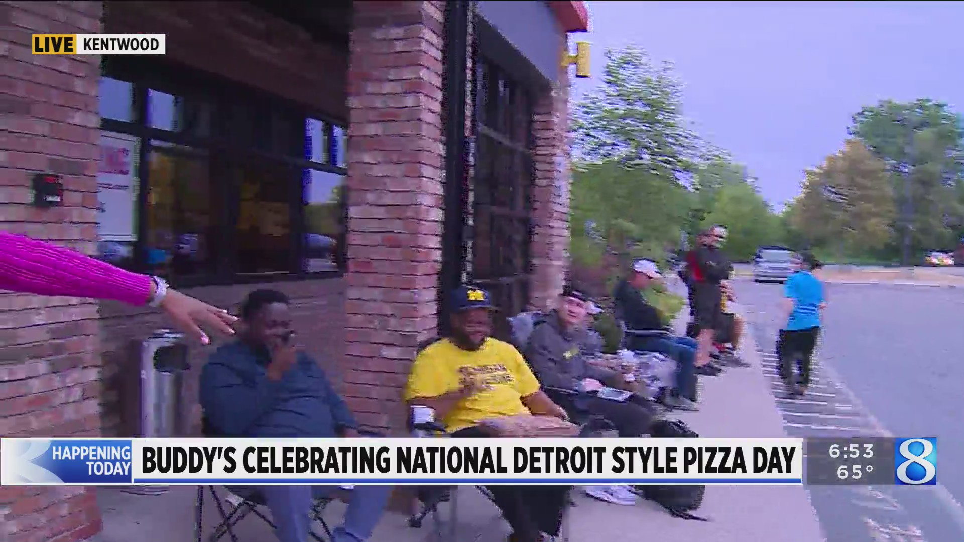 People wait in line to get free certificates for free pizzas at Buddy’s ...