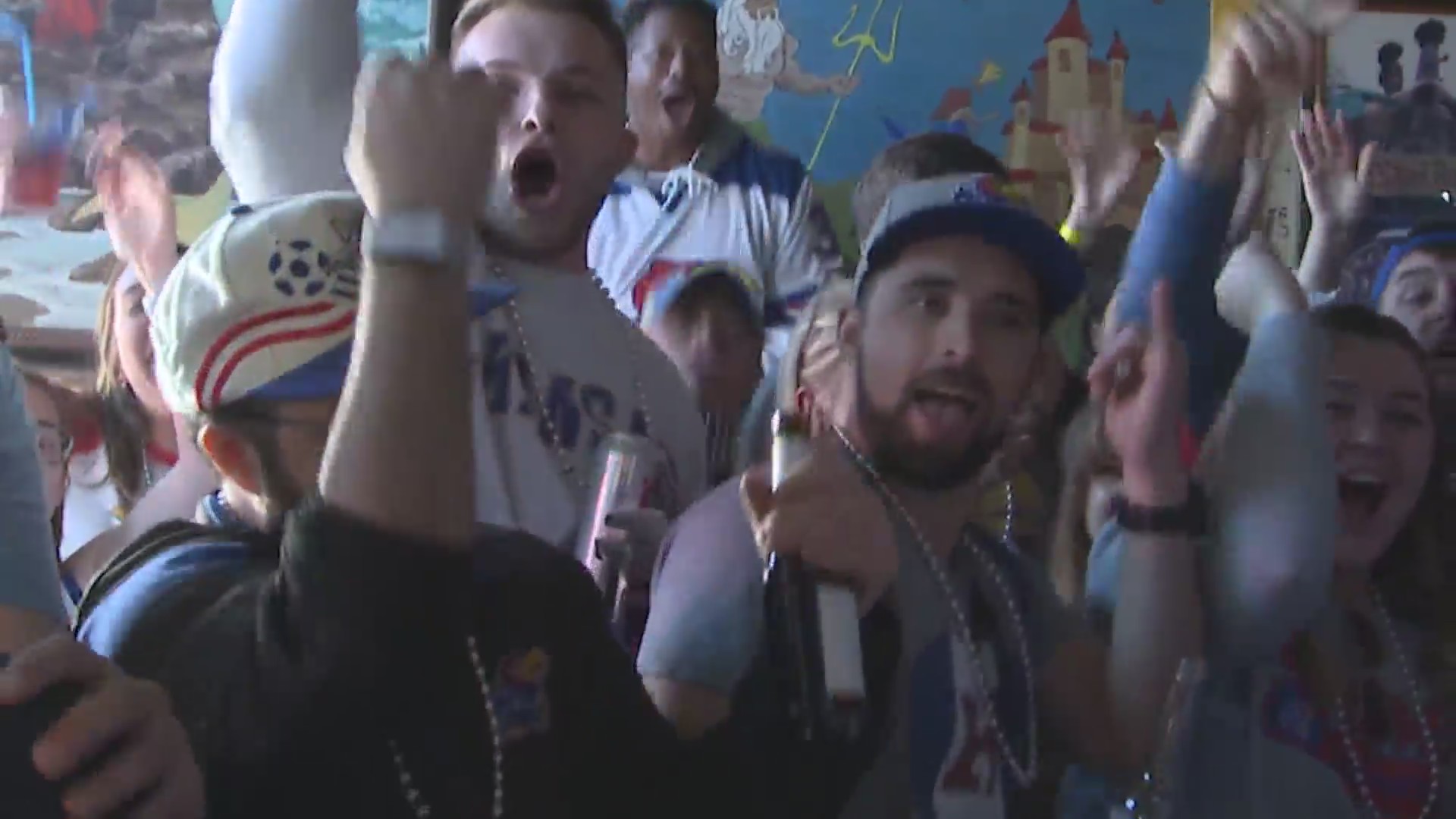 KU fans celebrate on Massachusetts Street following Final Four win ...