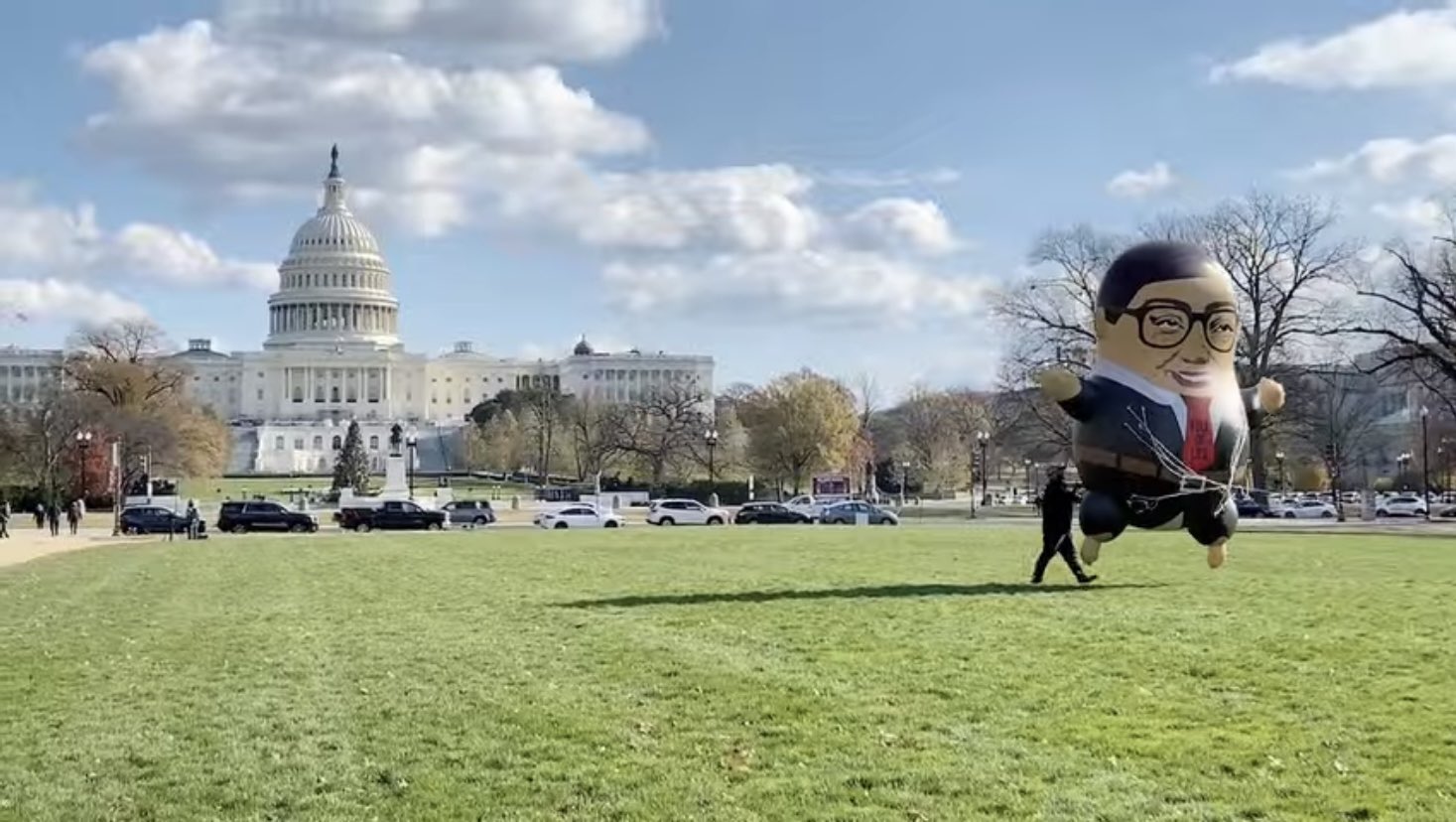 Nonprofit Flies Large George Santos Inflatable in Front of the US ...